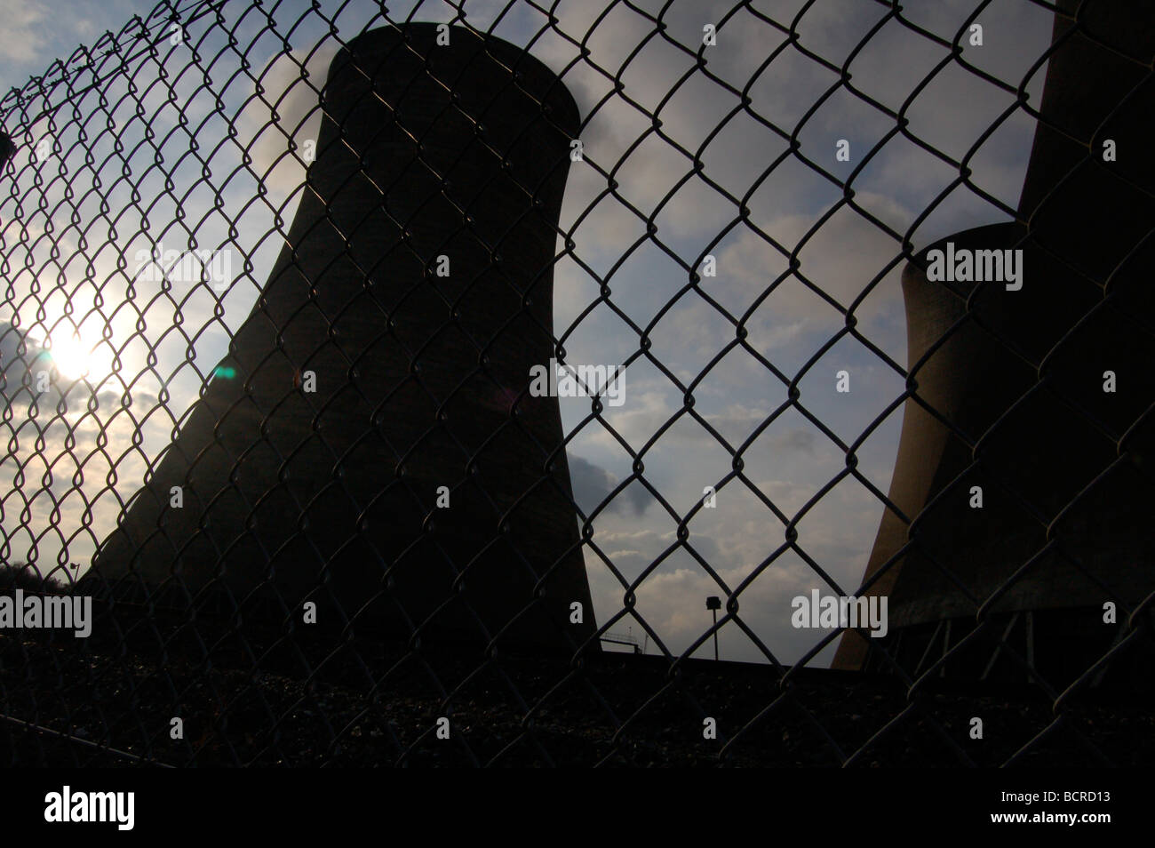 COOLING TOWERS AND FENCE Stock Photo - Alamy