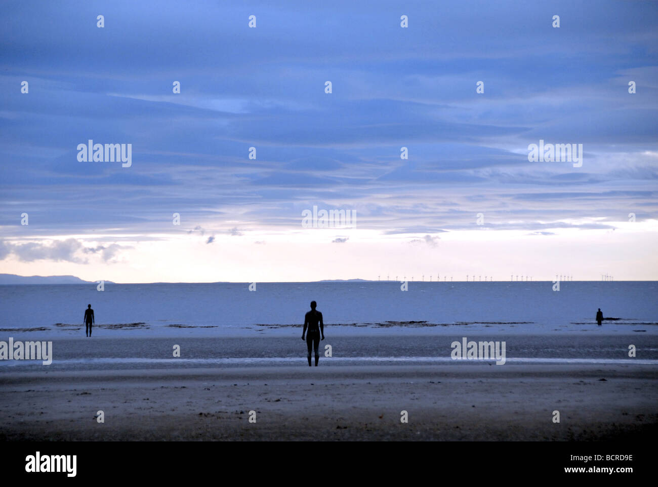 Anthony Gormley's Another Place in the estuary of the River Merser at ...
