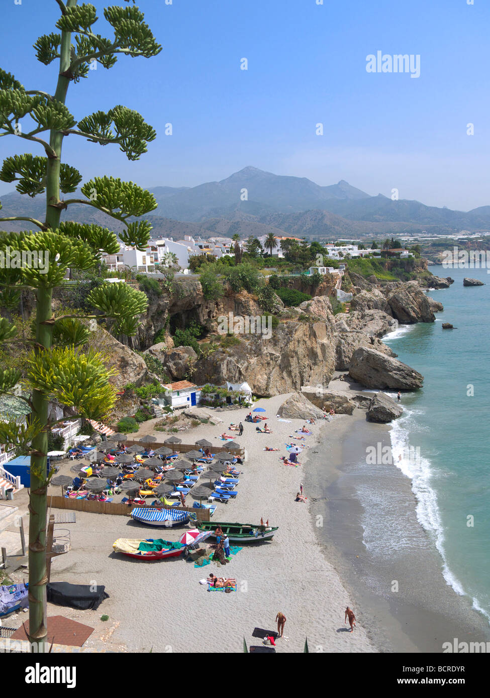 Beach scenes in Nerja, a sleepy Spanish Holiday resort on the Costa Del ...