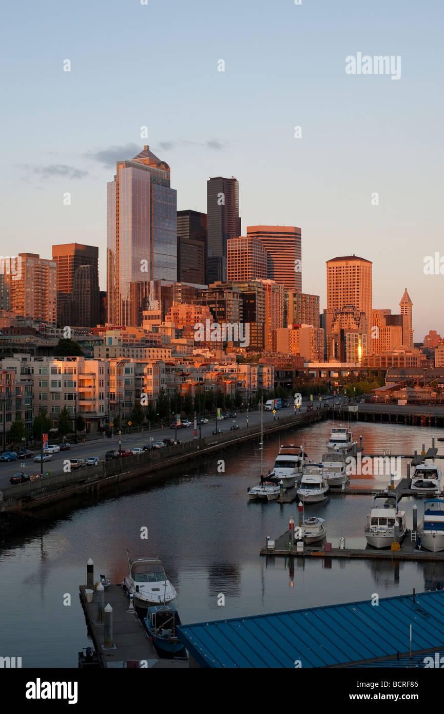 Retro image of Seattle skyline and Pier 66 illuminated at twilight with ...