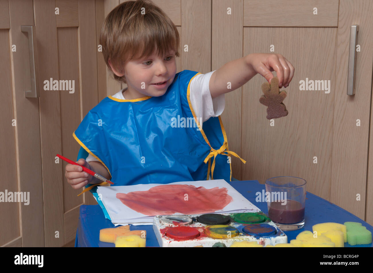Boy doing art hi-res stock photography and images - Alamy