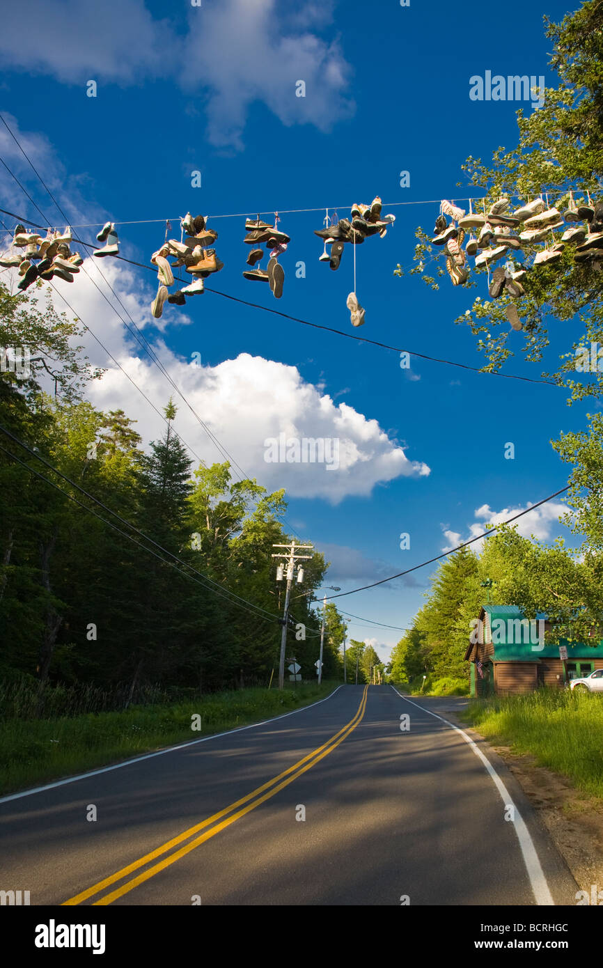 Sneakers hanging on wire over Big Moose Road in the Adirondack ...