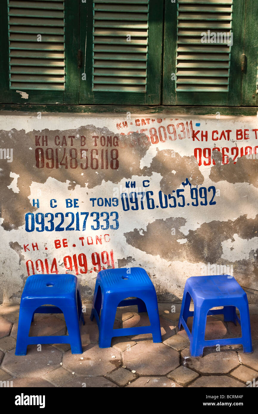 Three Plastic Stools on the street in Hanoi Vietnam Stock Photo - Alamy