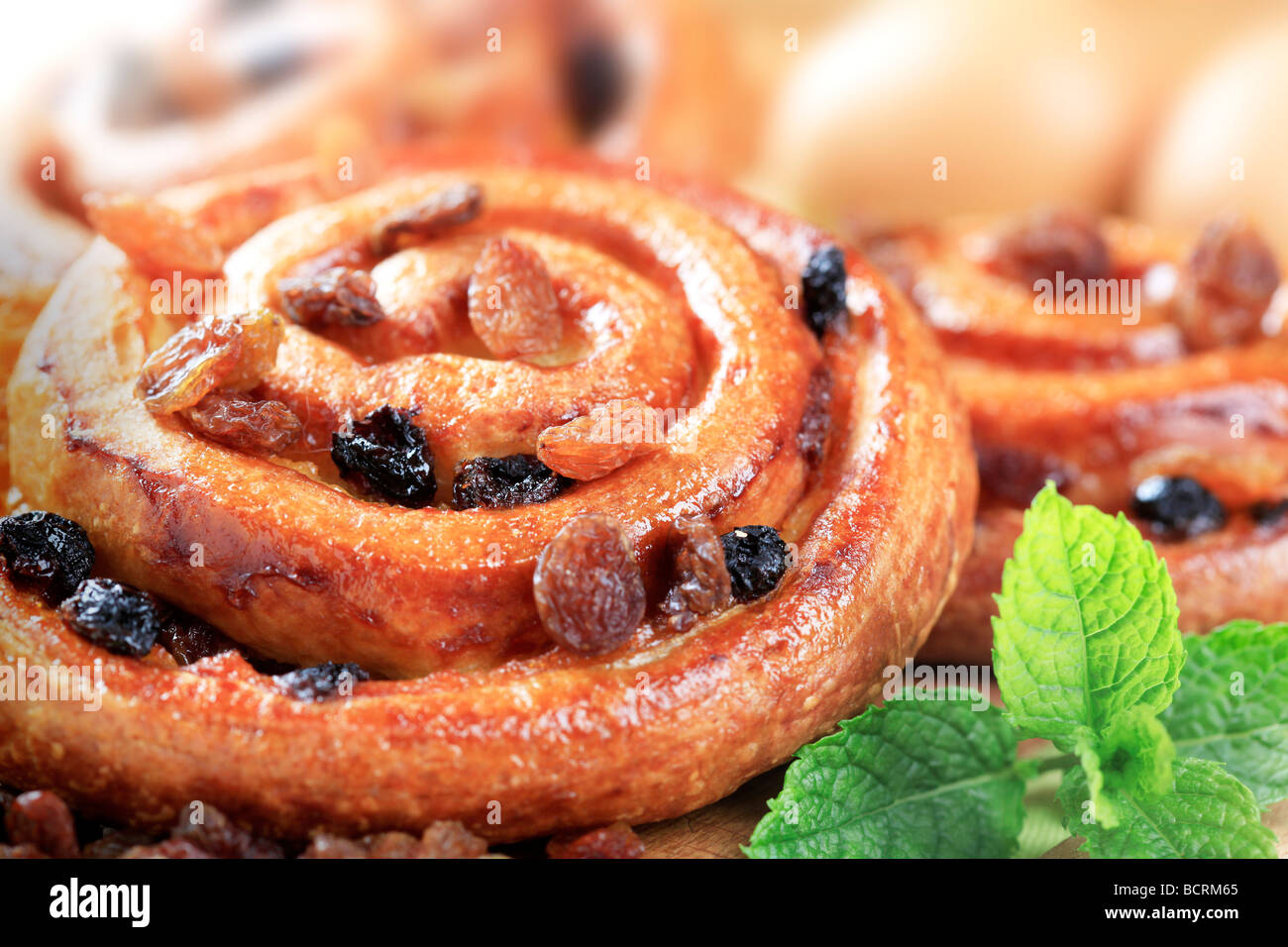 Sweet pastry with raisins Stock Photo - Alamy
