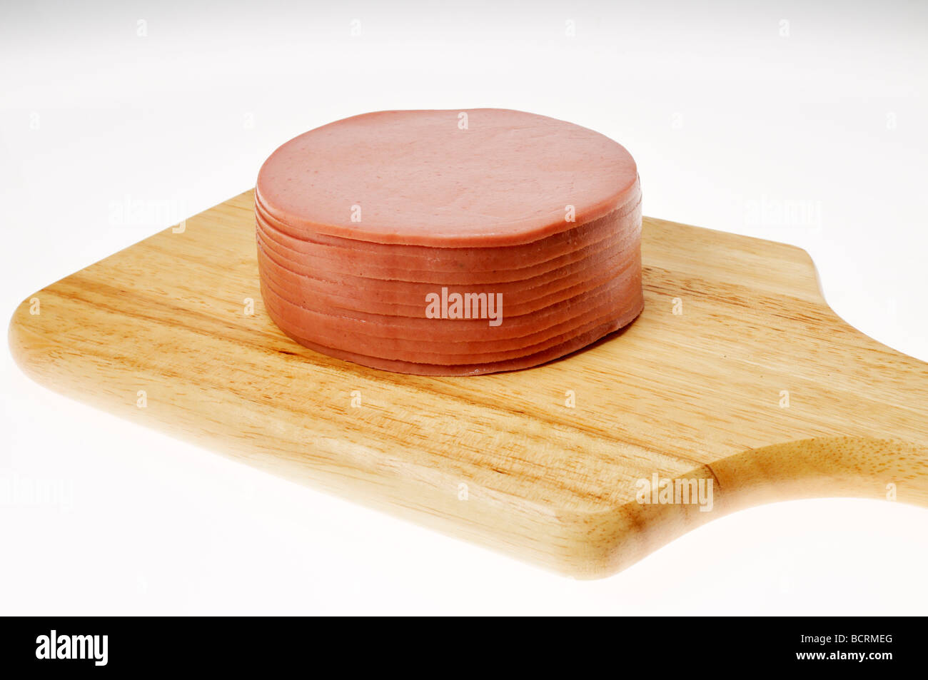 Stack of sliced beef bologna deli meat on cutting board Stock Photo - Alamy