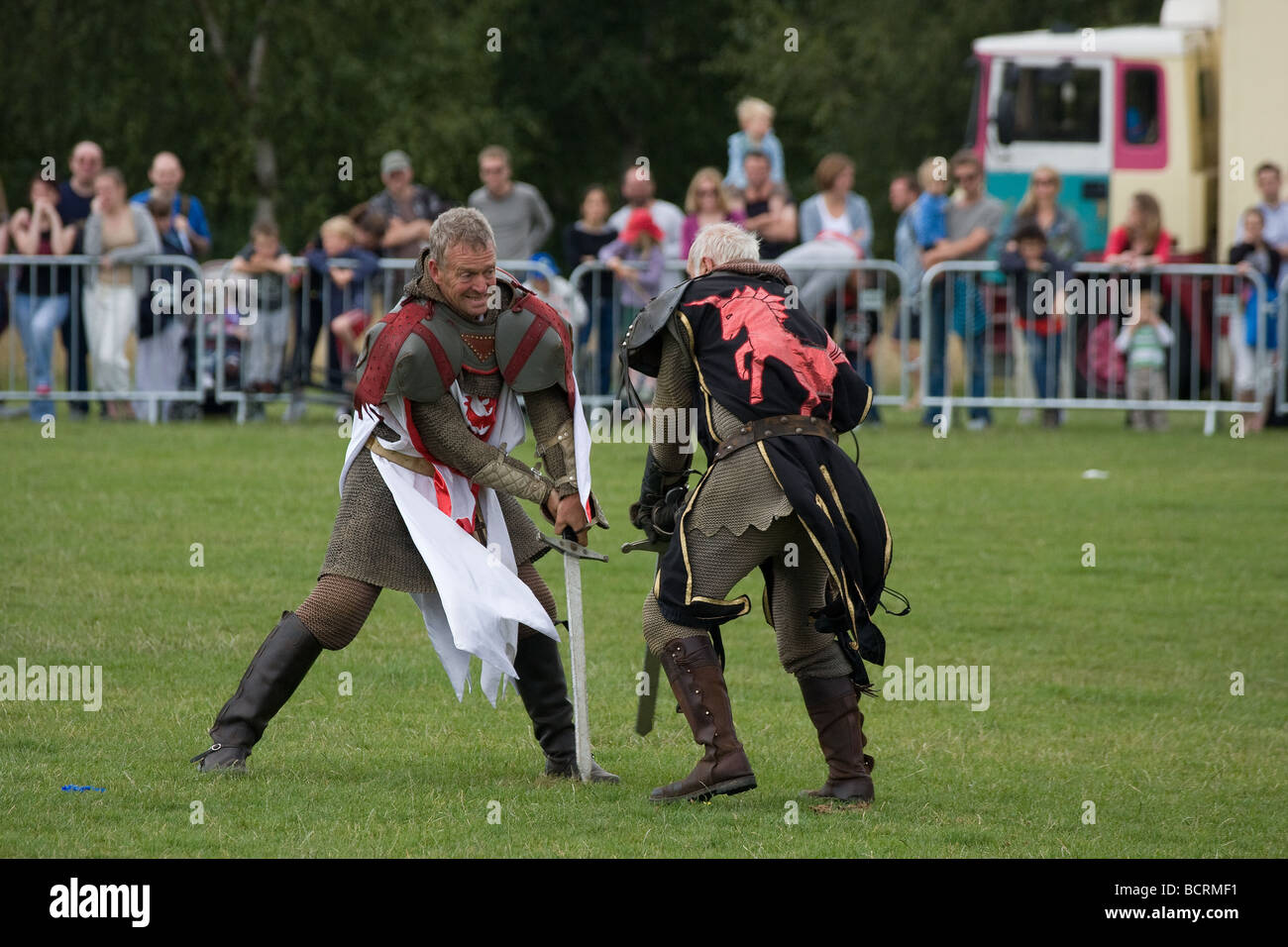 white black knight joust medieval sword fight hate Lambeth Country Show ...