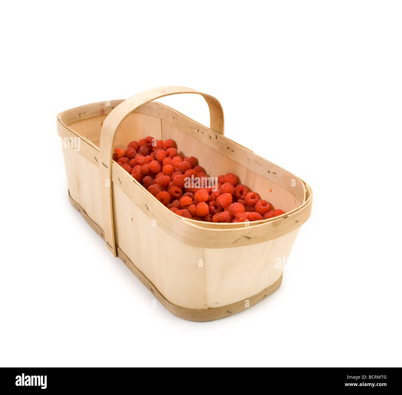 raspberries in basket Stock Photo - Alamy