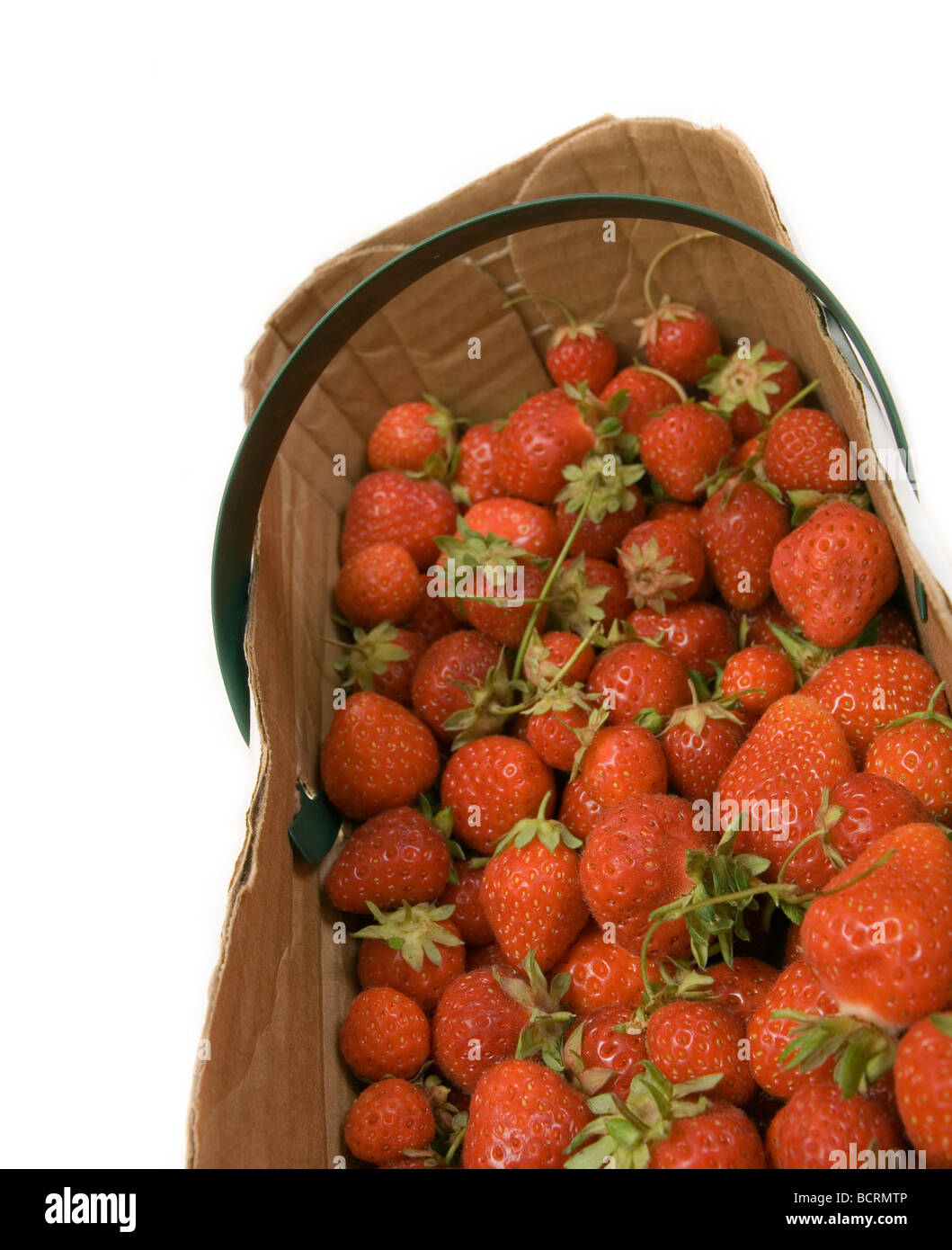 strawberry in cardboard basket Stock Photo - Alamy