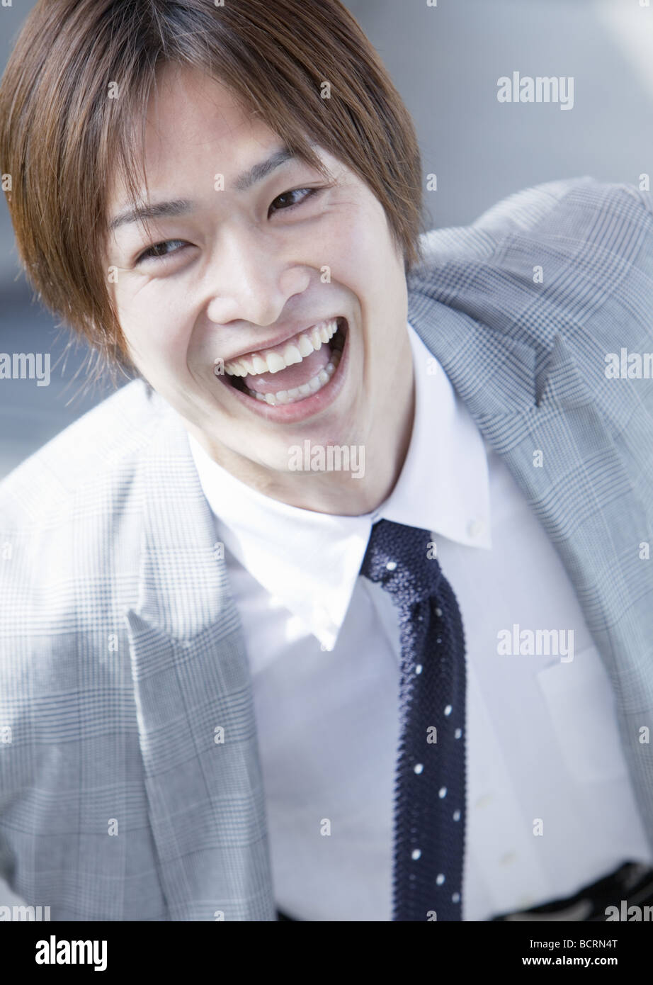 A smiling businessman Stock Photo - Alamy