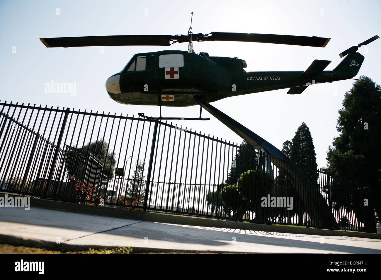 A dustoff Huey helicopter which flew in the Vietnam War is perched on a ...