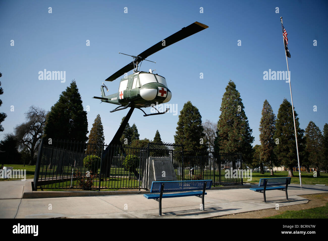 A dustoff Huey helicopter which flew in the Vietnam War is perched on a ...