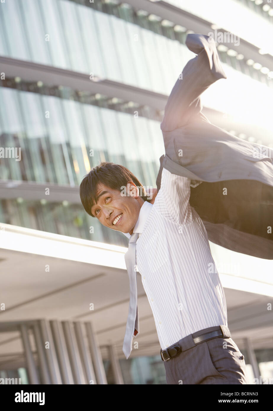 A smiling businessman Stock Photo - Alamy