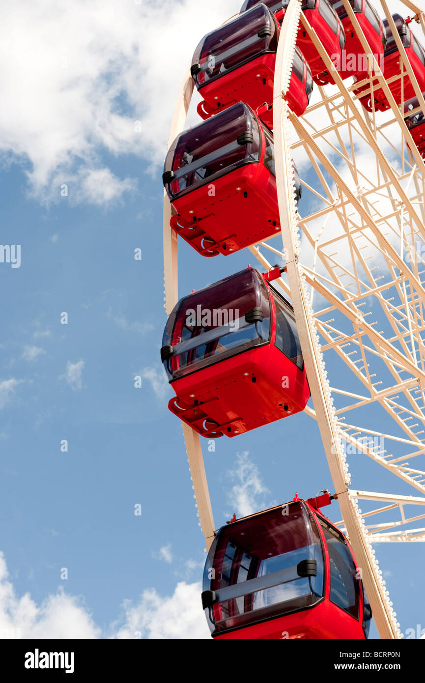 Cars on a big wheel Stock Photo - Alamy