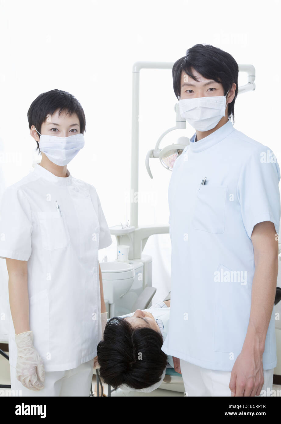 Dentist surgical mask dental instruments hi-res stock photography and ...