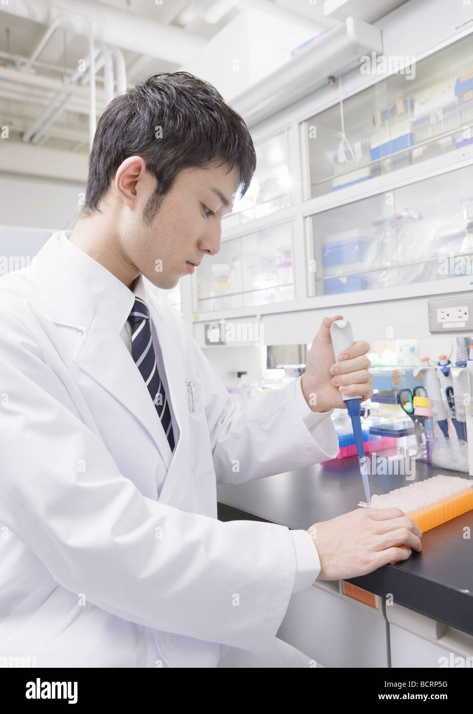 A researcher doing experiment Stock Photo - Alamy
