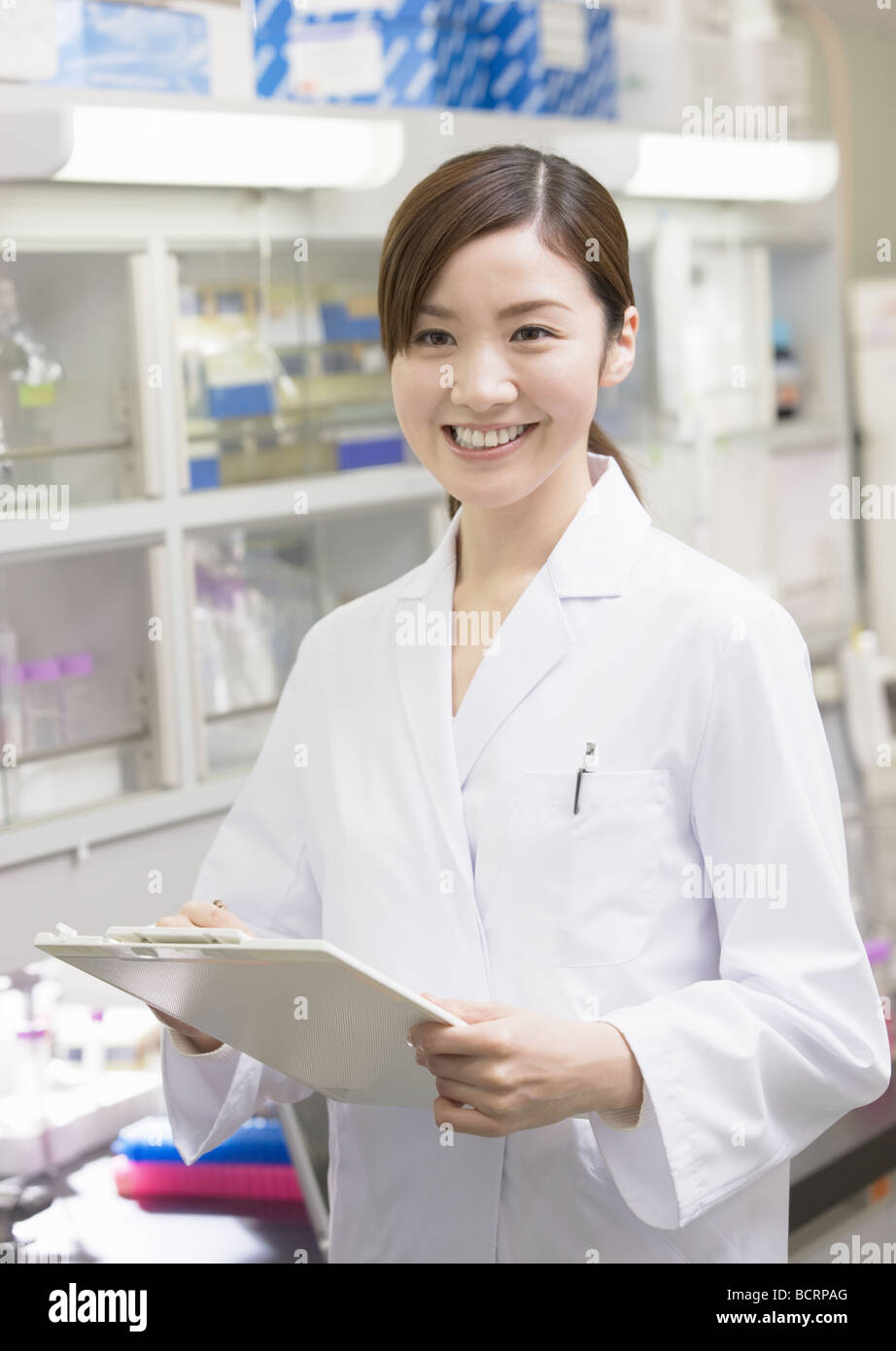 A smiling researcher Stock Photo - Alamy