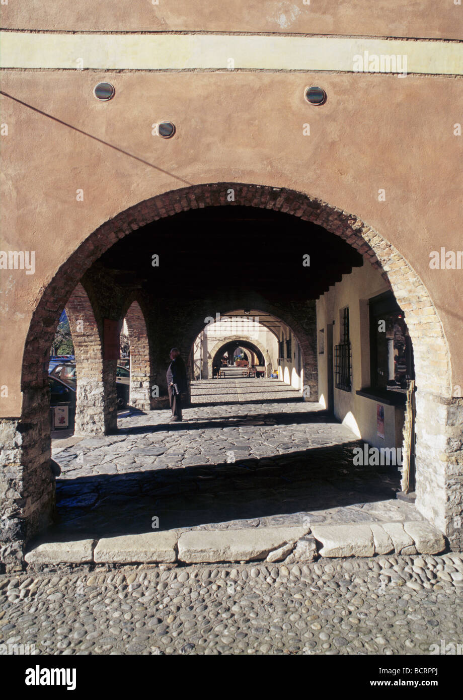 columnar arcade along a street in Bissone Lake Lugano canton of Ticino ...