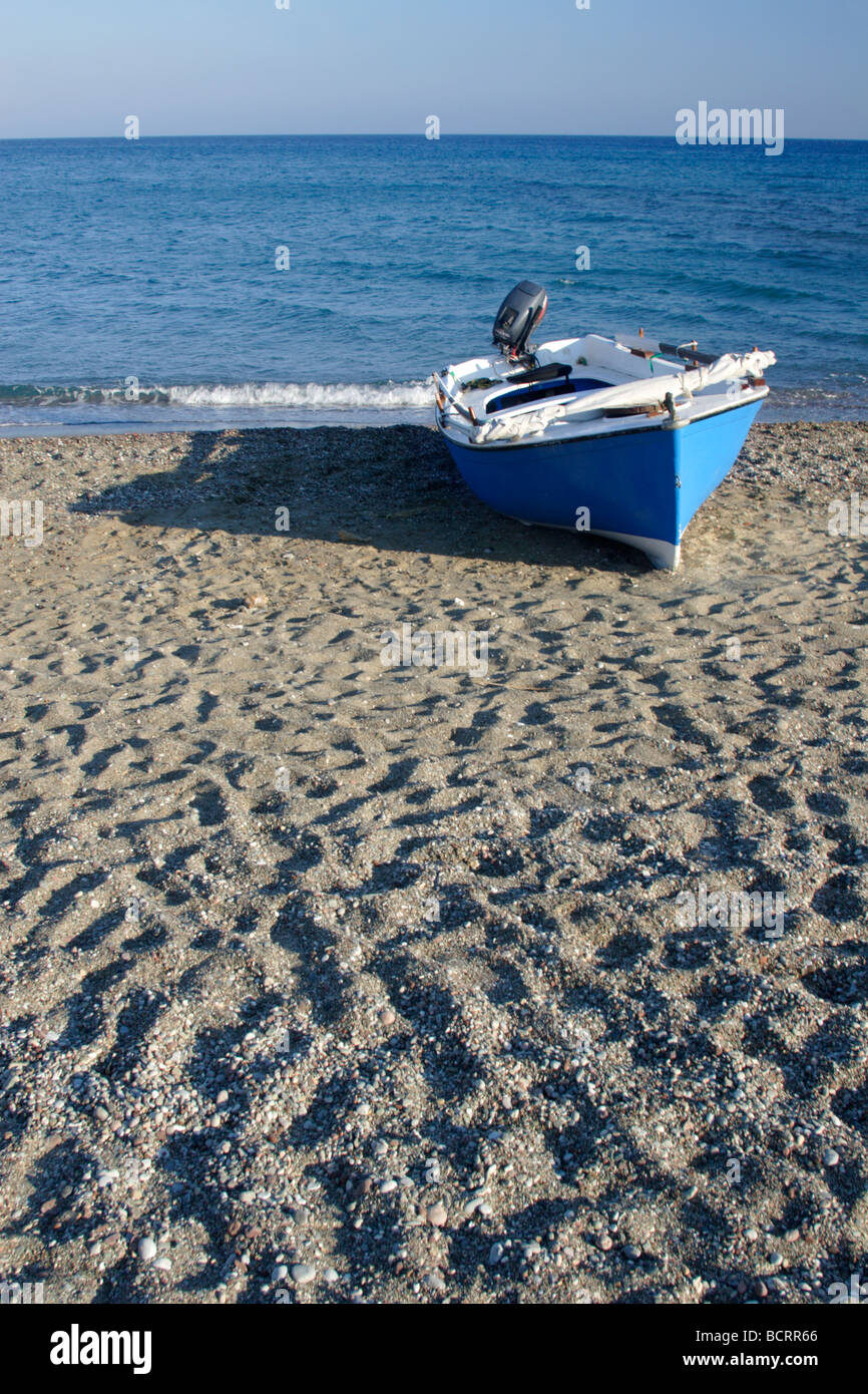 Small motor boat on beach in Lothiarika, near Lardos, Rhodes ...