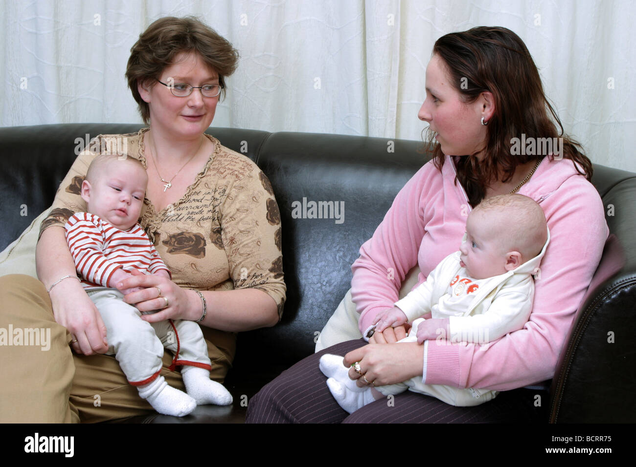 Child Helping Another Child High Resolution Stock Photography and ...