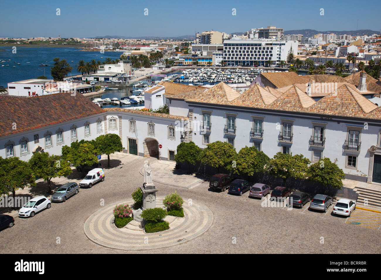 View of Faro town centre will Old City in foreground and the marina ...