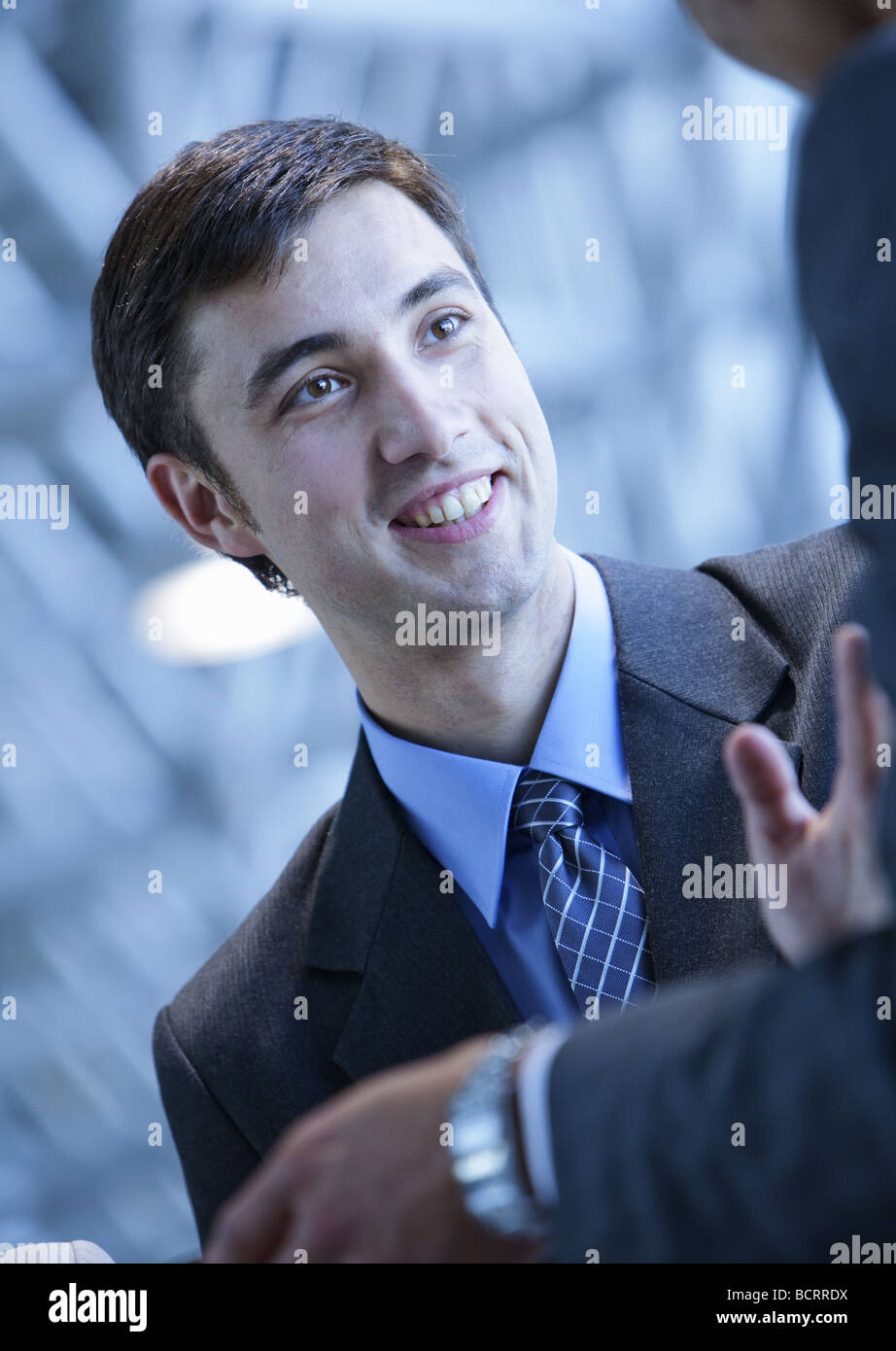 A smiling businessman Stock Photo - Alamy