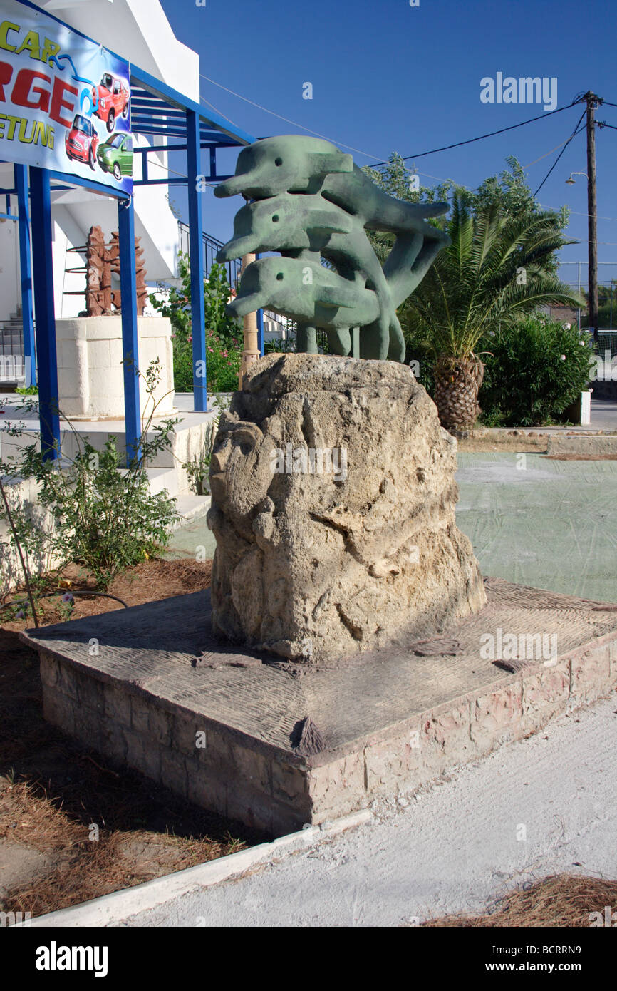 Dolphin statue in Lothiarika Rhodes Dodecanese Islands Greece Stock ...