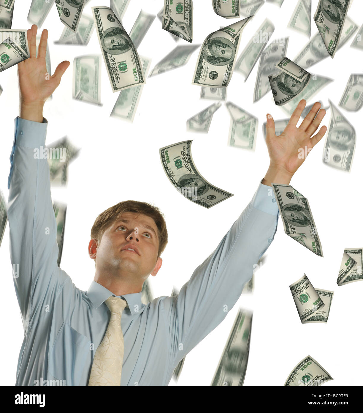 The young businessman falling dollars It is isolated on a white ...