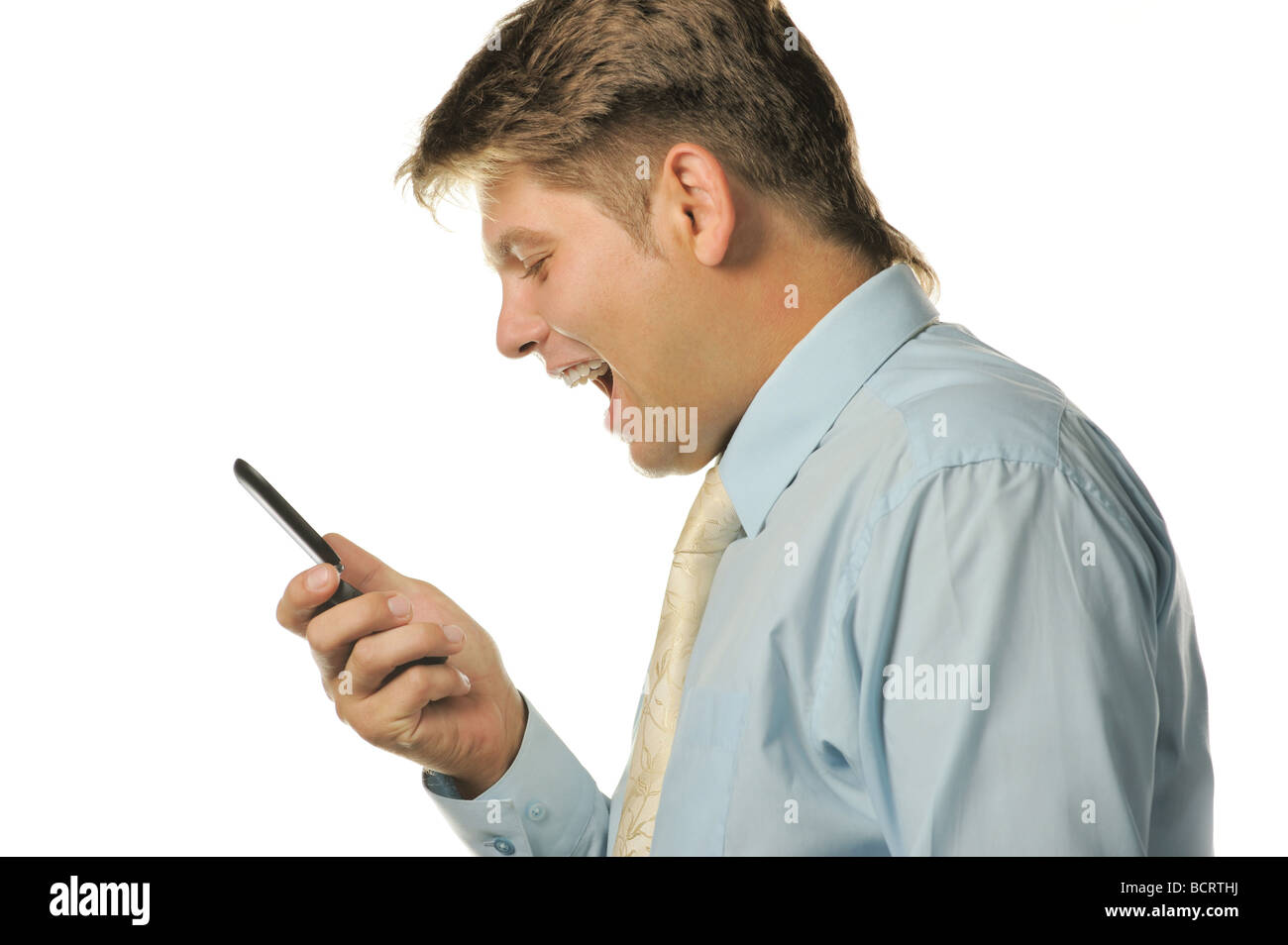 The young businessman with a mobile phone Shouting in phone It is ...