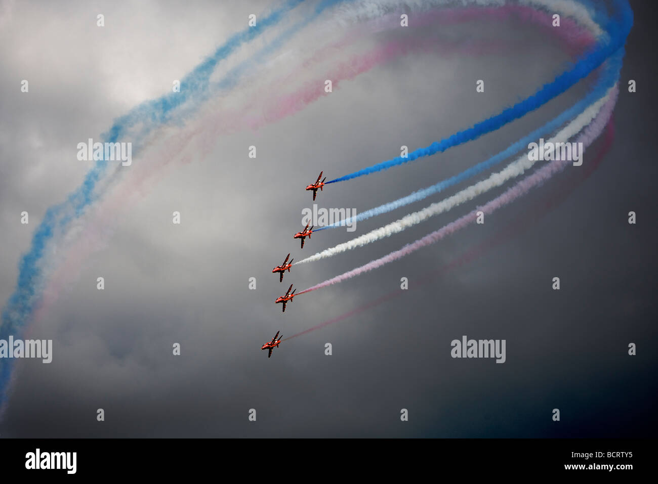 The world famous Red Arrows aerobatic display team perform their 2009 ...