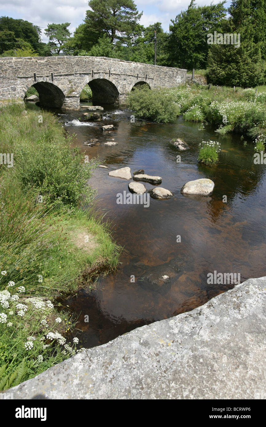 Village of Postbridge, England. The three arched bridge on the B3212 at ...