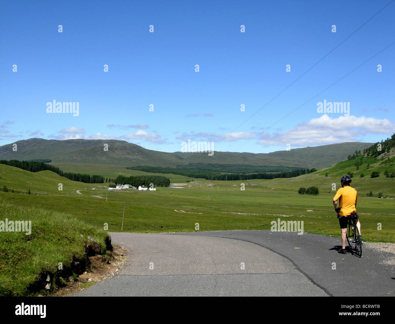 Cycling on General Wades road through Inverness-shire Scotland Stock ...