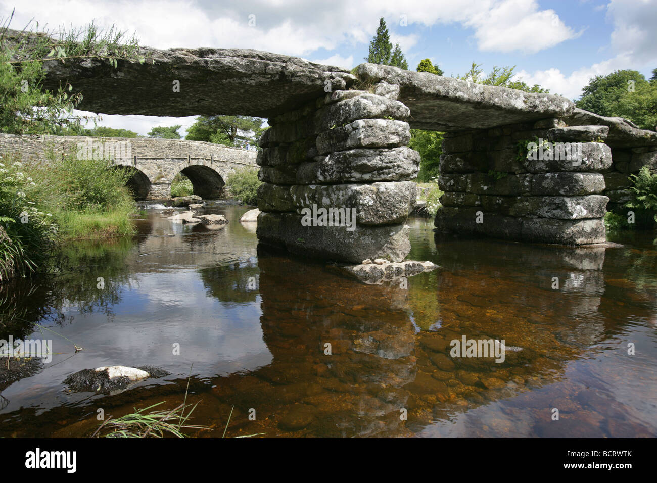 Village of Postbridge, England. The East Dart River flowing under the ...