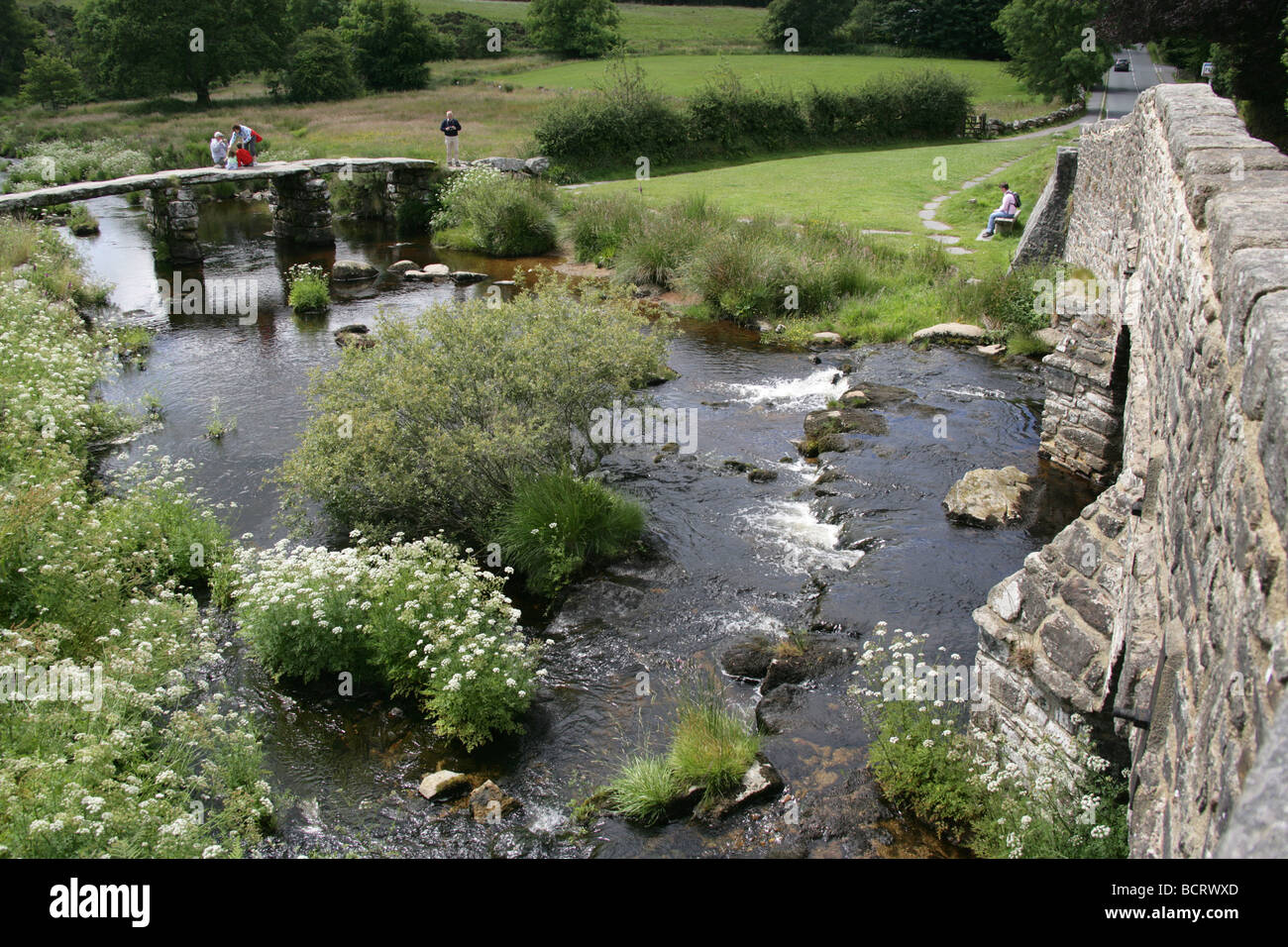 Village of Postbridge, England. The East Dart River flowing under the ...