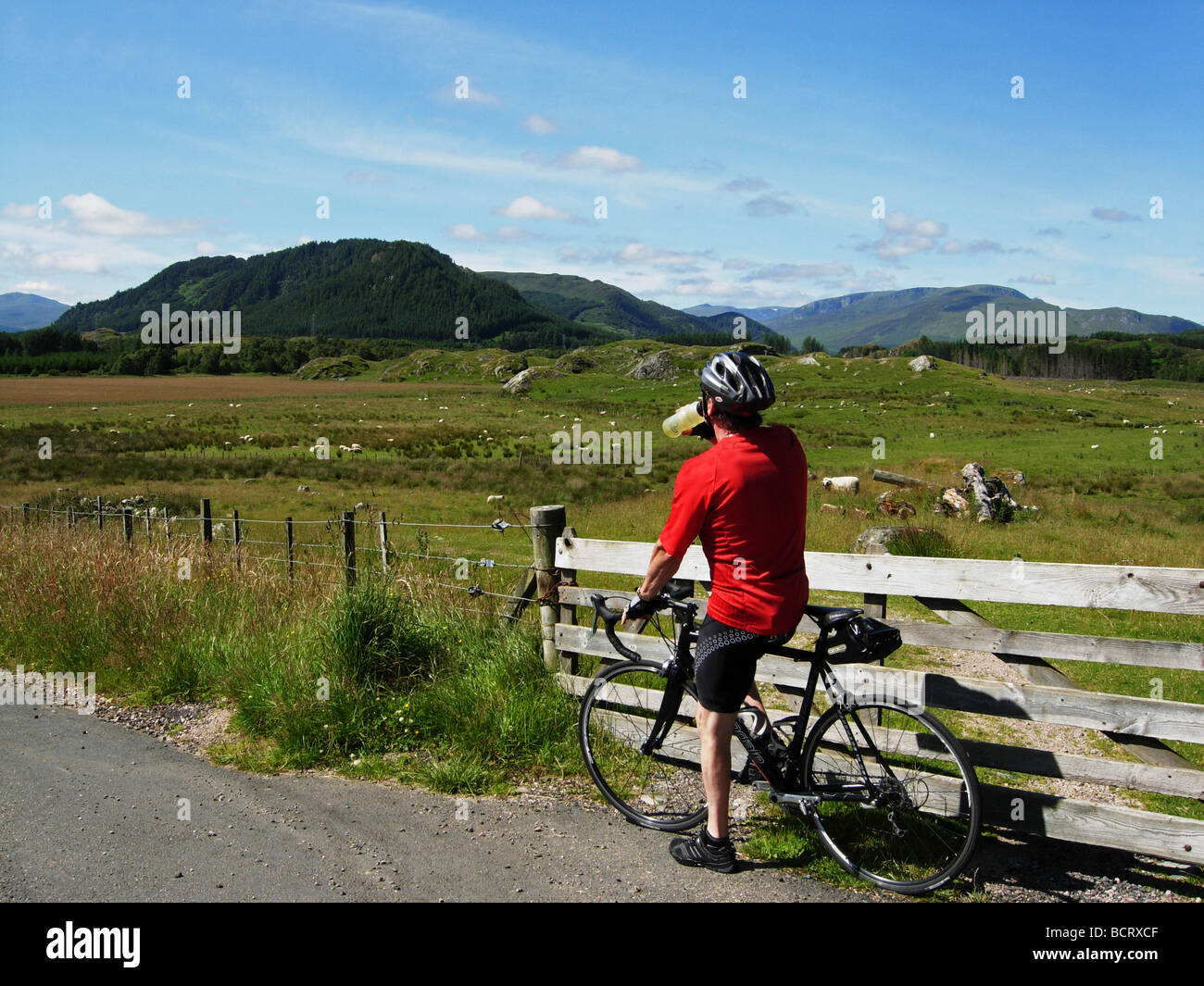 Cycling on General Wades road through Inverness-shire Scotland Stock ...