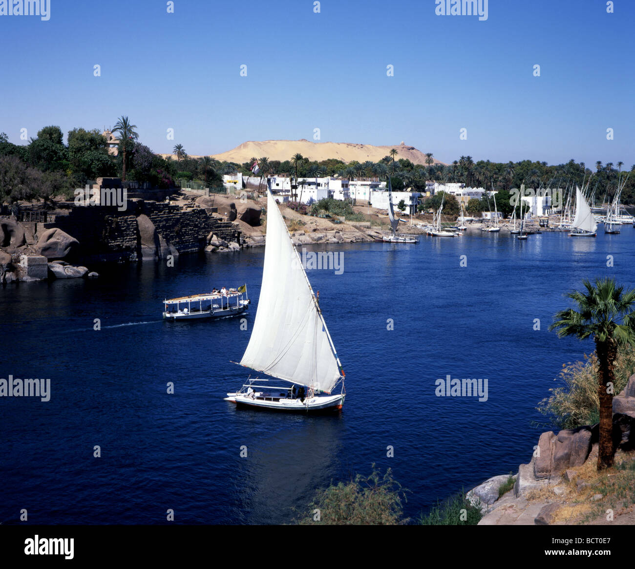 A Felucca sailing on The Nile between The Old Cataract Hotel and ...