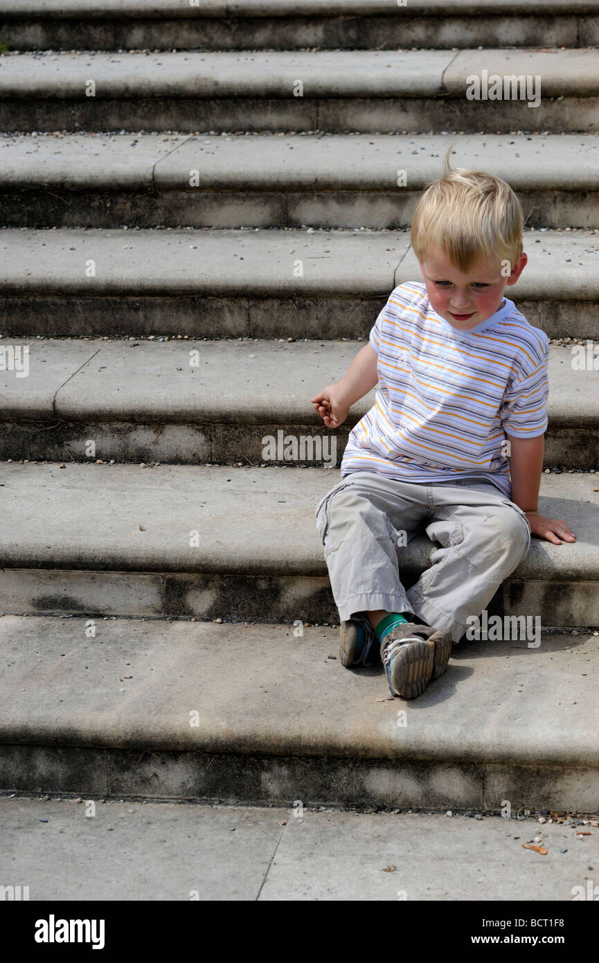 Little Blond Boy Sitting on Steps Stock Photo - Alamy Little Blond Boy Sitting on Steps Stock Photo - Alamy