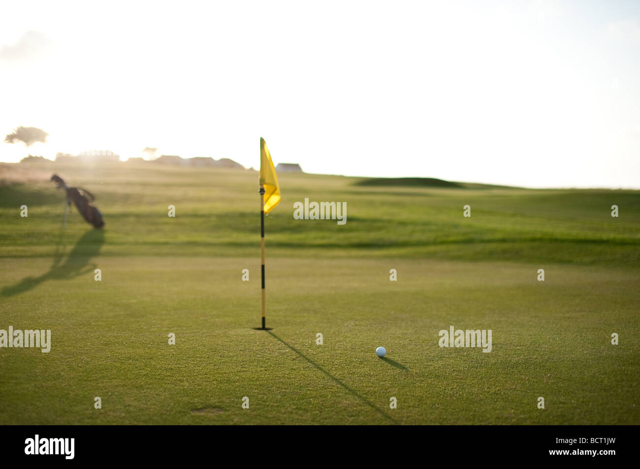 Golf course, flags and balls Stock Photo - Alamy