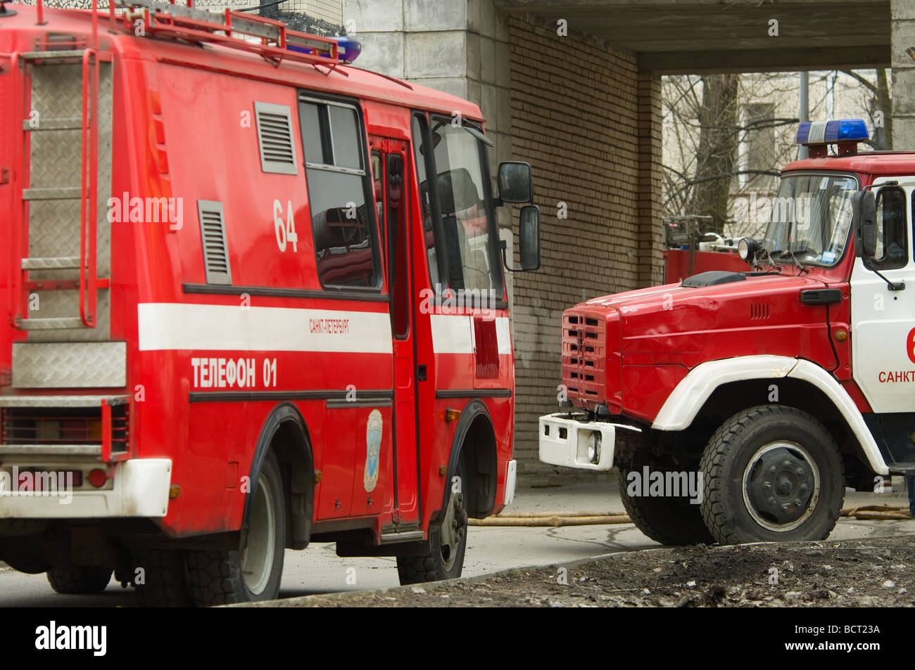 Red Russian firefighting vehicles on fire extinguishing. Russia Stock ...