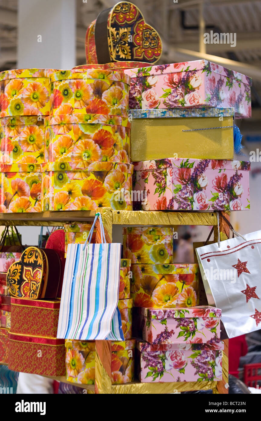 Heap of packing color gift boxes and package are on the bundling table ...