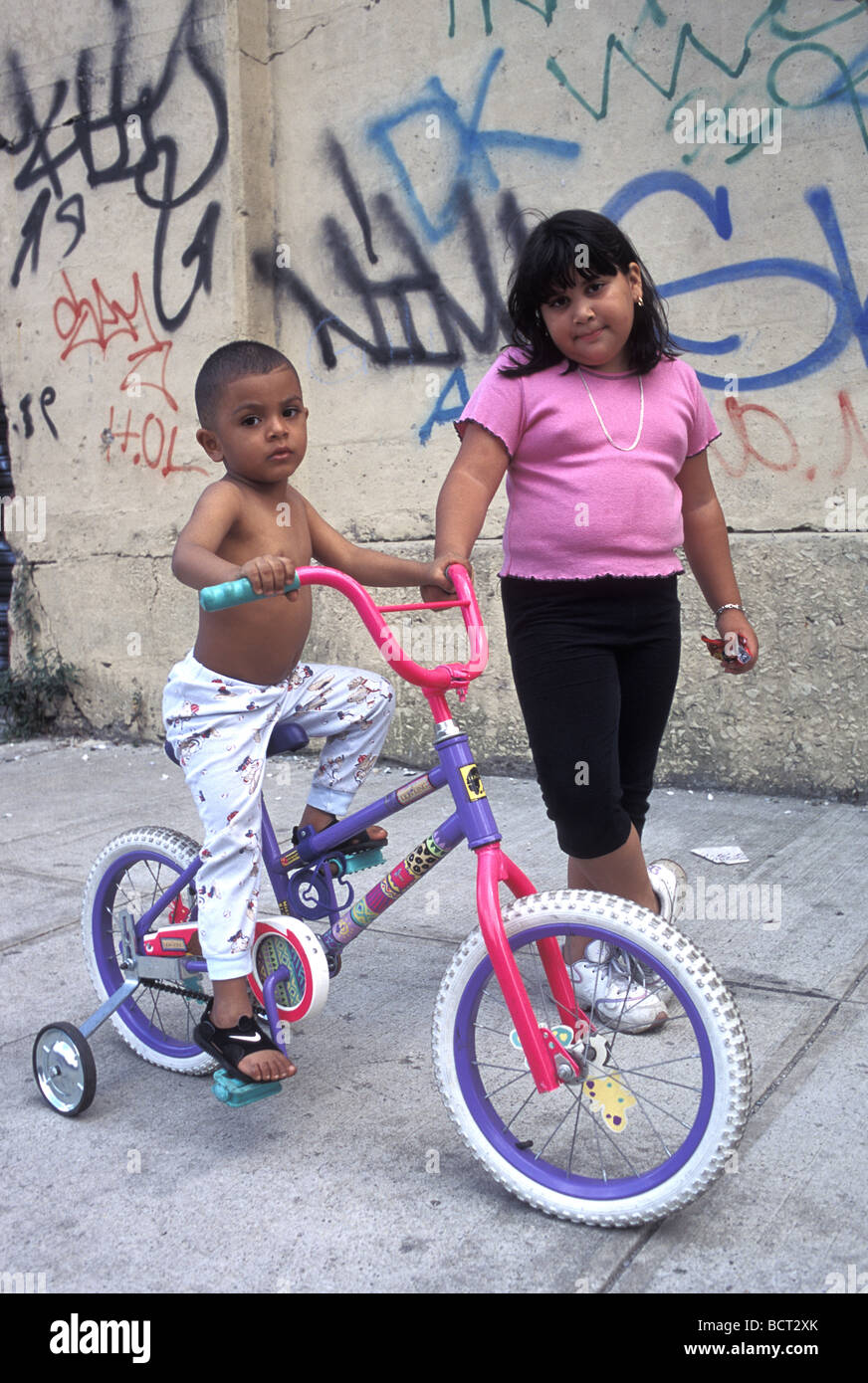 Children playing on the sidewalk Bushwick Brooklyn NY Stock Photo - Alamy