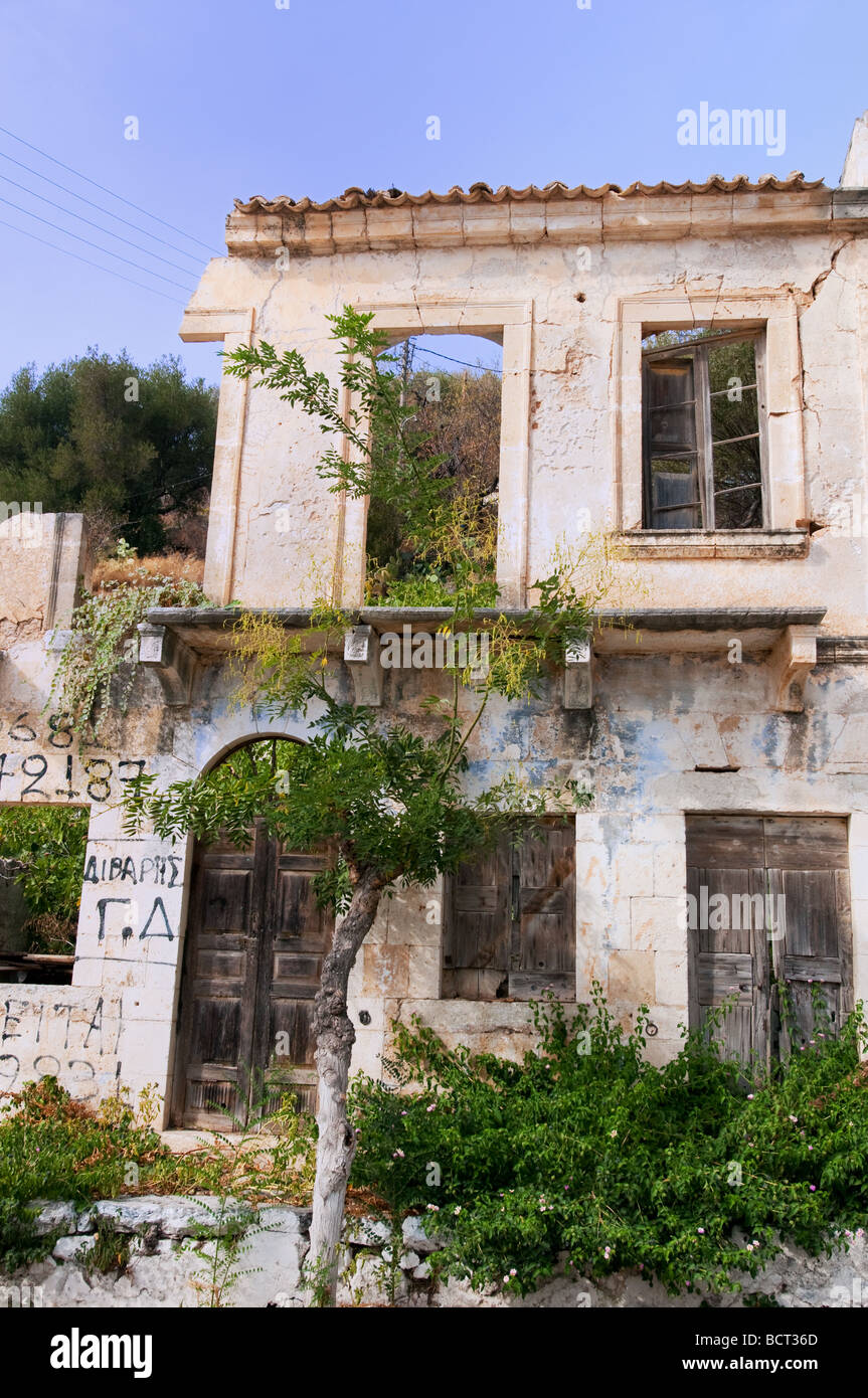 Old damaged houses in Assos by the earthquake from 1953 Stock Photo - Alamy