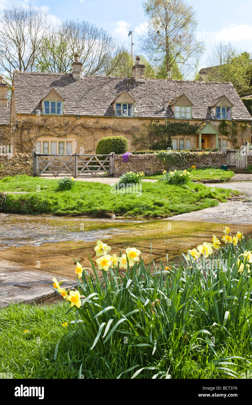 Cottages beside the ford across the River Eye in the Cotswold village ...