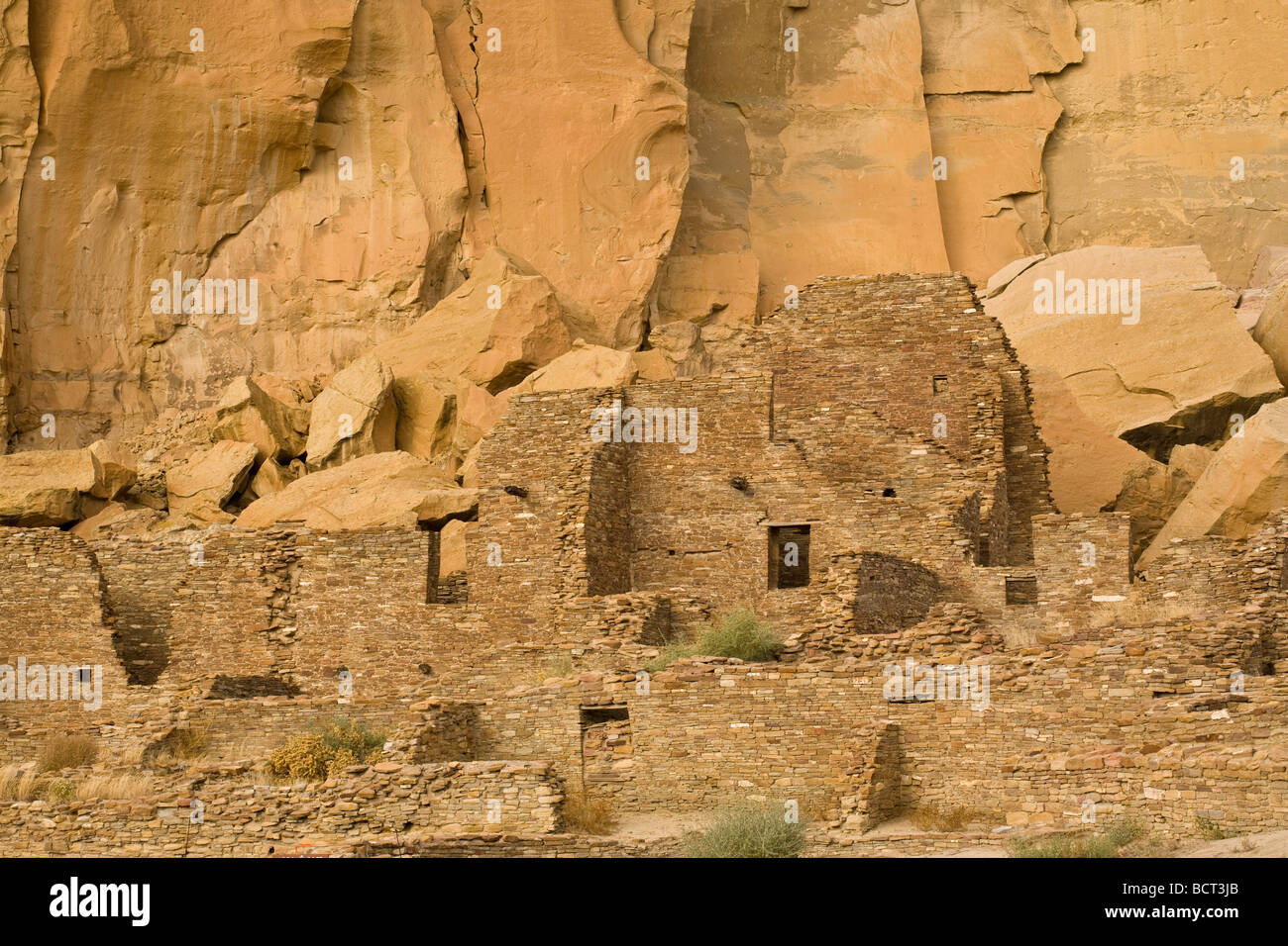 Pueblo Bonito is situated at the base of sheer walled cliffs at Chaco ...