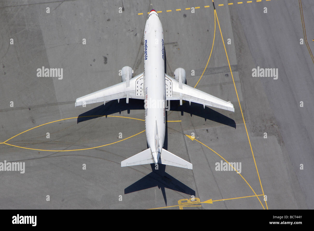 Jet airline on the ground viewed from above Stock Photo - Alamy