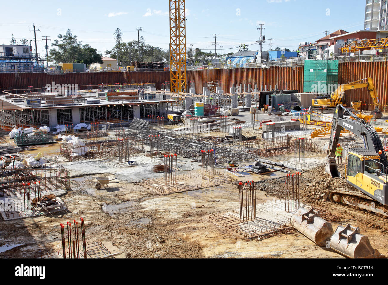 Constructing the concrete and steel foundations for a highrise building ...