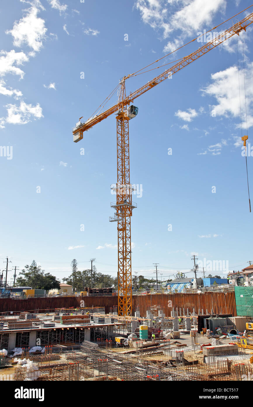 Constructing the concrete and steel foundations for a highrise building ...