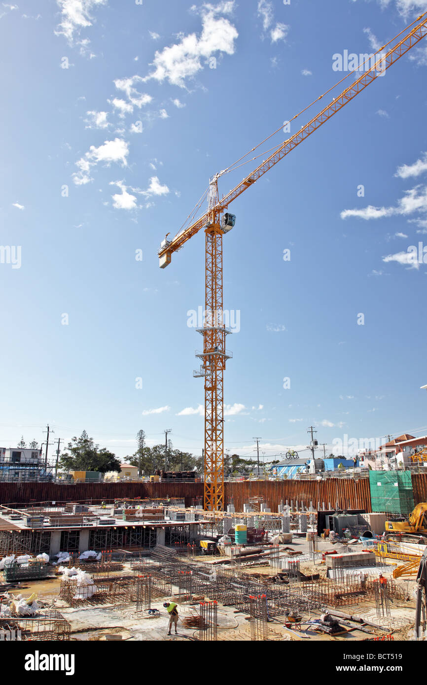 Constructing the concrete and steel foundations for a highrise building ...