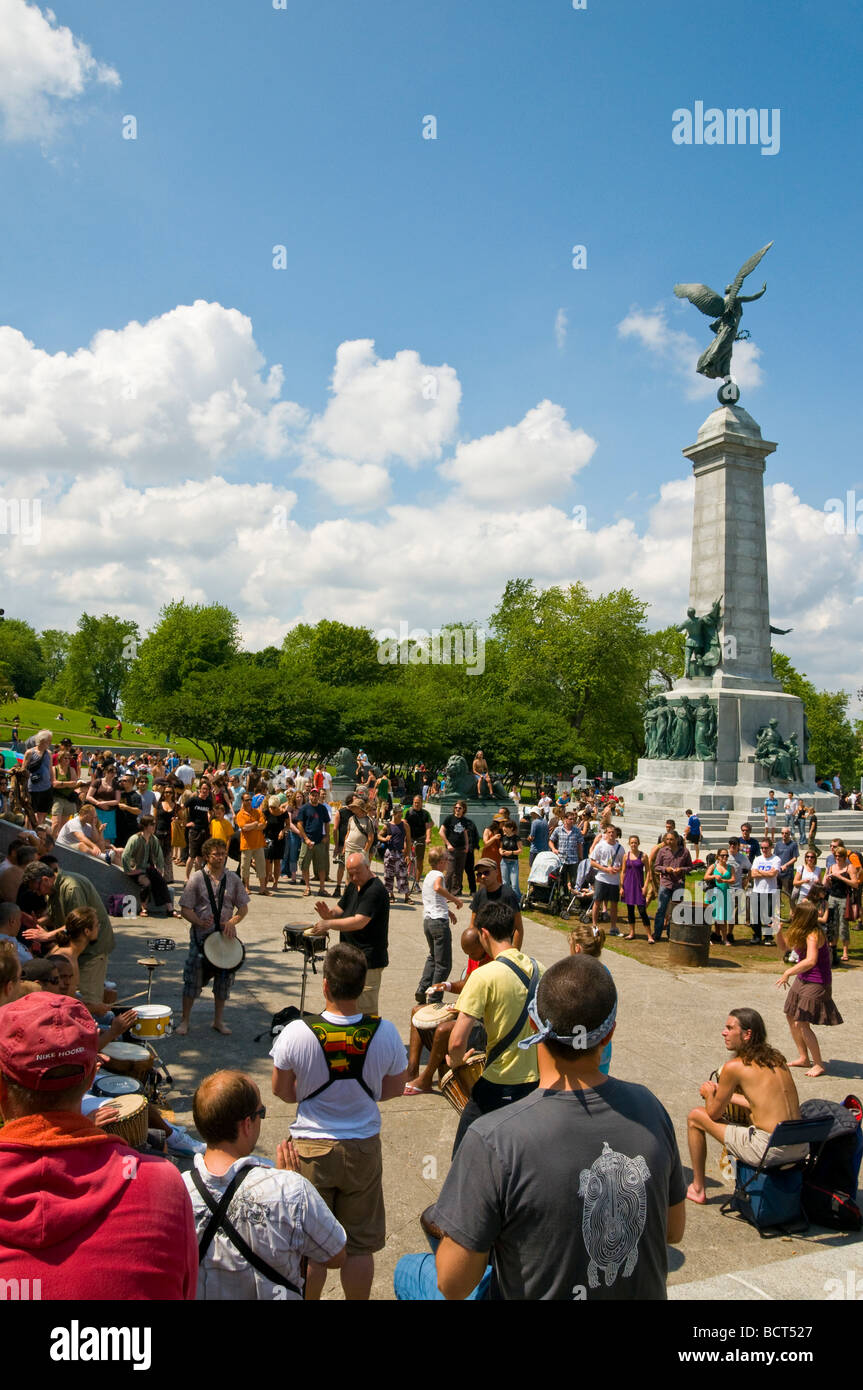 People playing tam tams in the Jeanne Mance park Montreal Quebec Canada ...