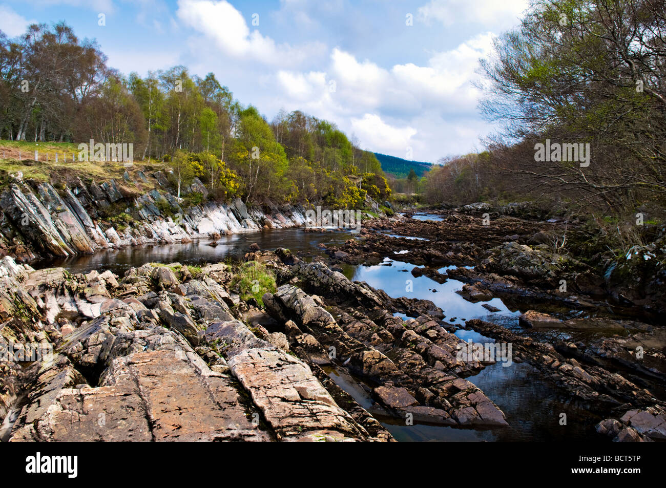 River Carron along rocky patch of river taken along single track road ...