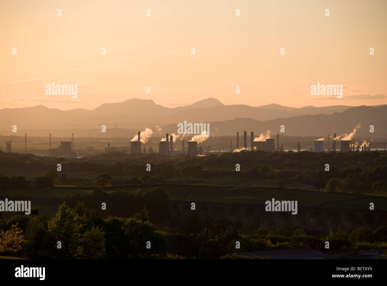 Grangemouth complex with Ochils and Trossach hills in background Stock ...